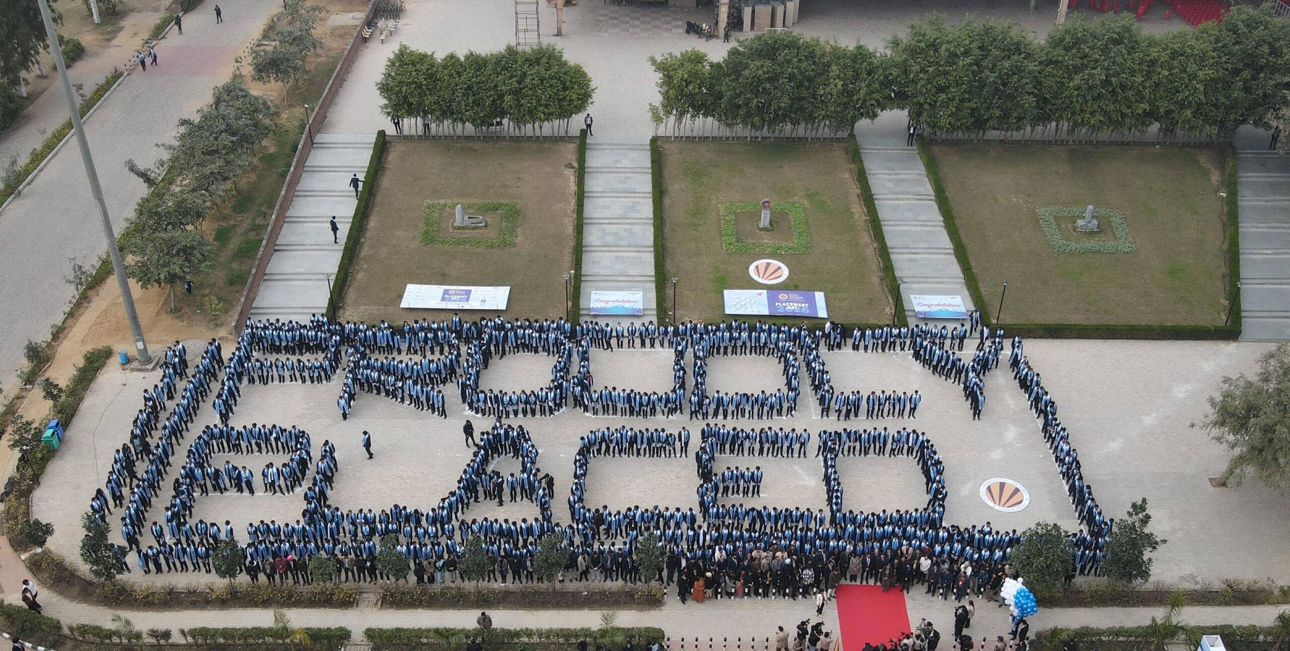 Hundreds of students form “Proudly Placed,” symbolising collective ...